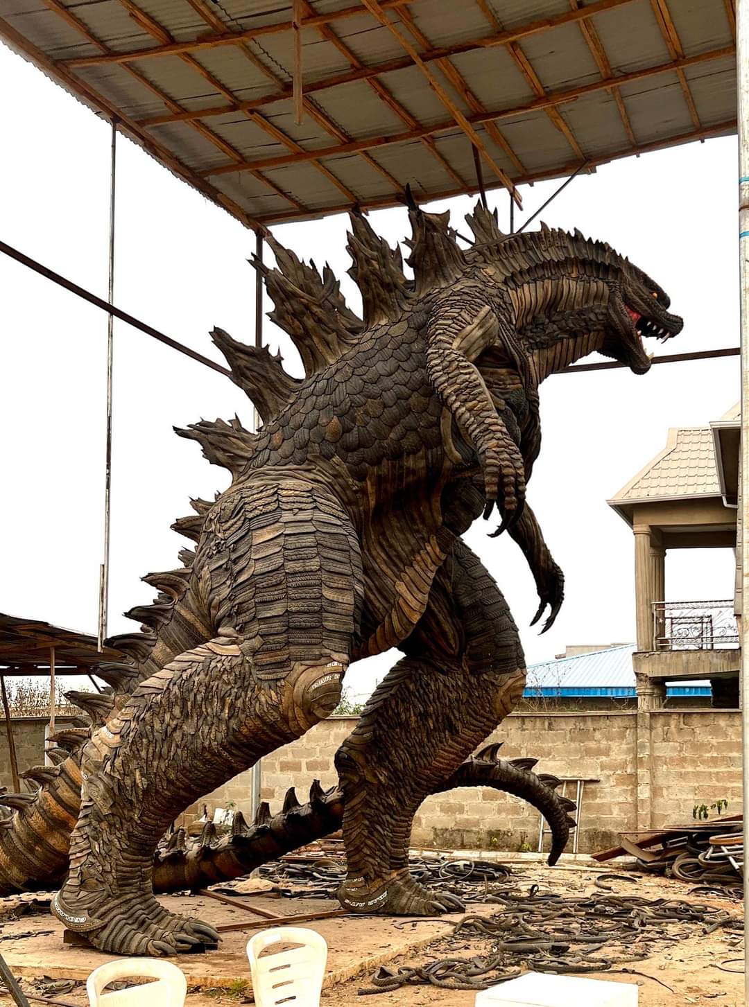 Nigerians built a 24-foot tall Godzilla statue out of recycled tires!